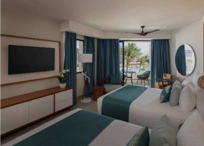 Junior Suite Tropical view or Pool view King Bed or 2 Doubles – Luxe
